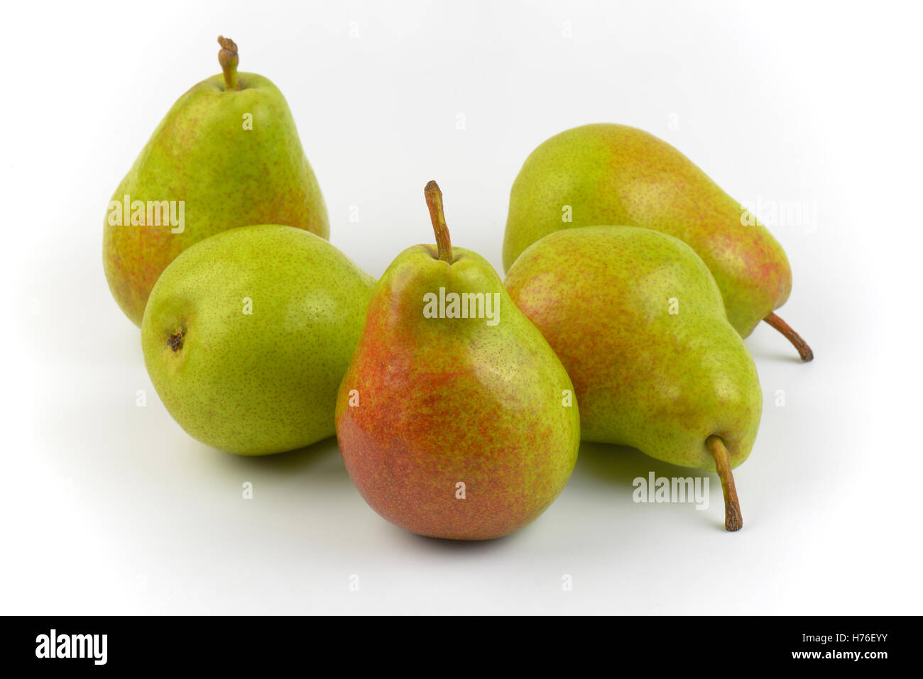 group of ripe pears on white background Stock Photo - Alamy