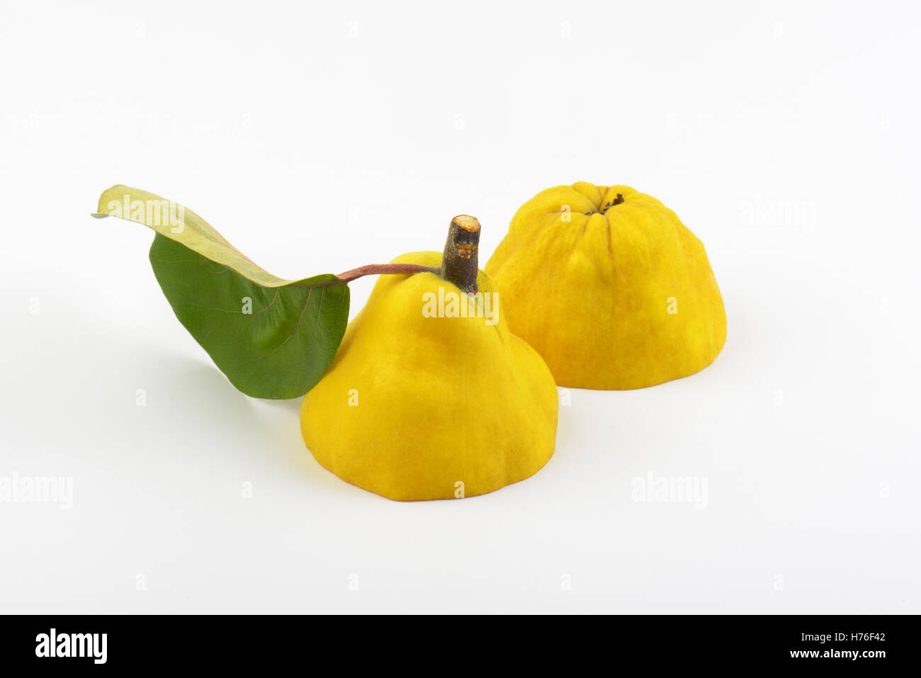 halved yellow pear on white background Stock Photo - Alamy