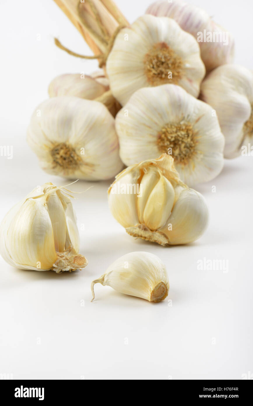 close up of garlic bulbs and cloves on white background Stock Photo - Alamy
