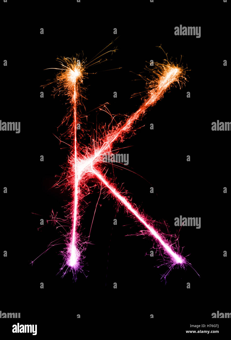 Sparkler firework light alphabet K (Capital Letters) at night ...