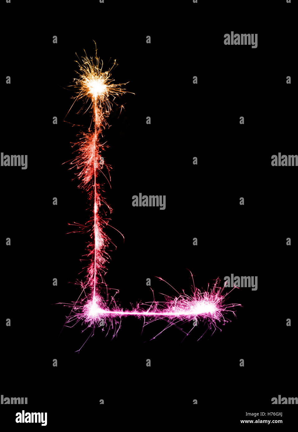 Sparkler firework light alphabet L (Capital Letters) at night ...