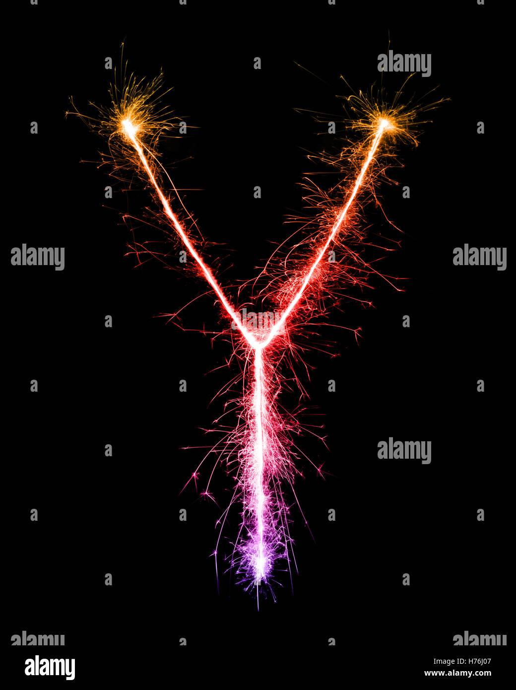 Sparkler firework light alphabet Y (Capital Letters) at night ...
