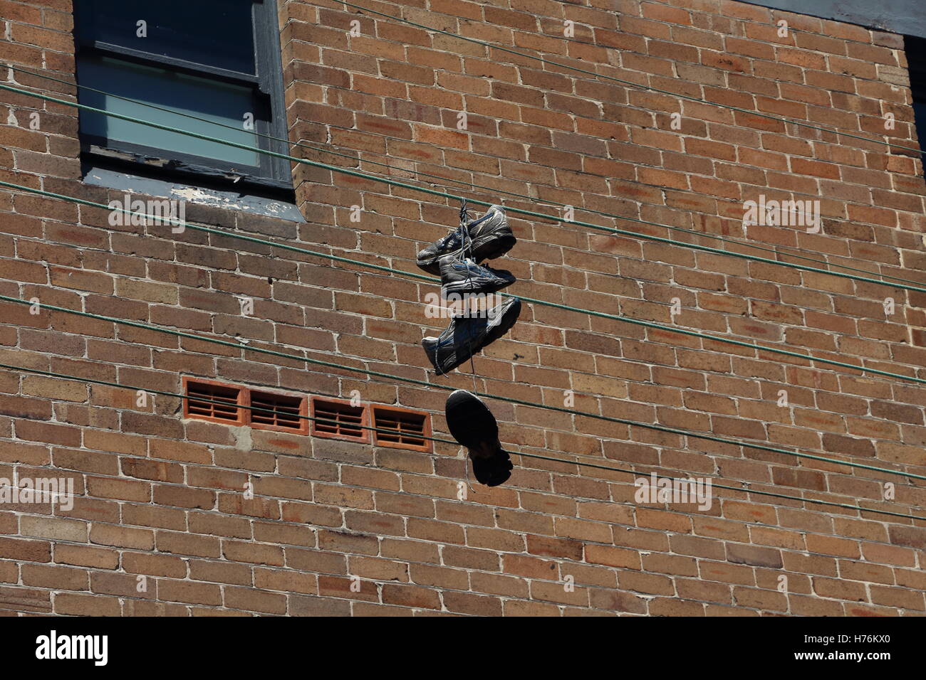 Hanging from wires hi-res stock photography and images - Alamy
