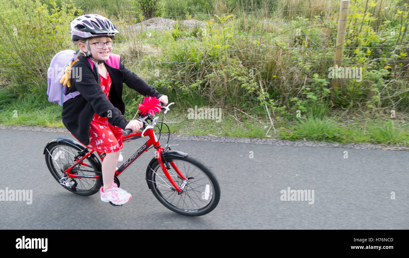 Girl on bicycle Stock Photo - Alamy