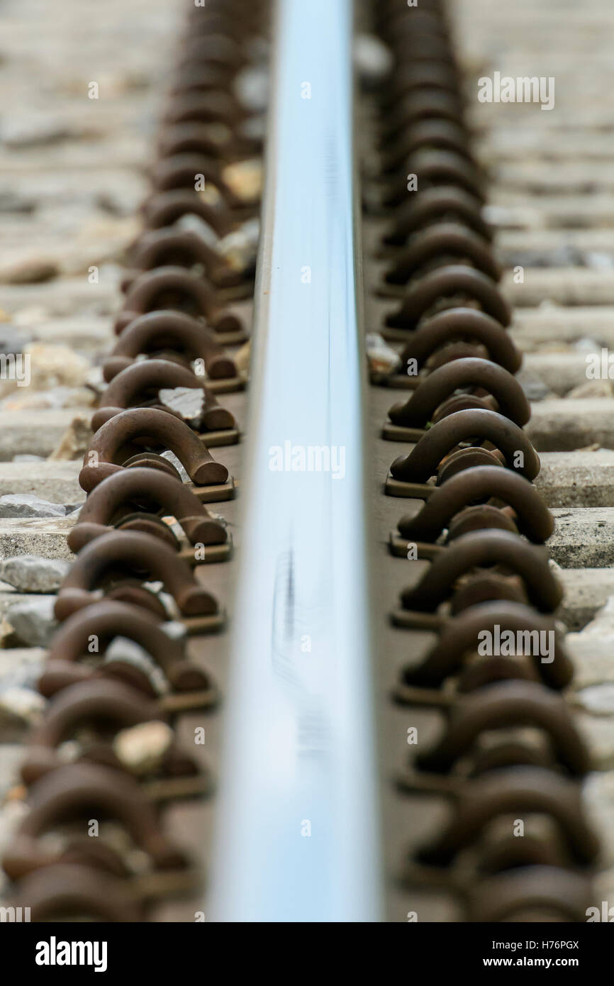 Detailed close up photo of a railroad track Stock Photo - Alamy
