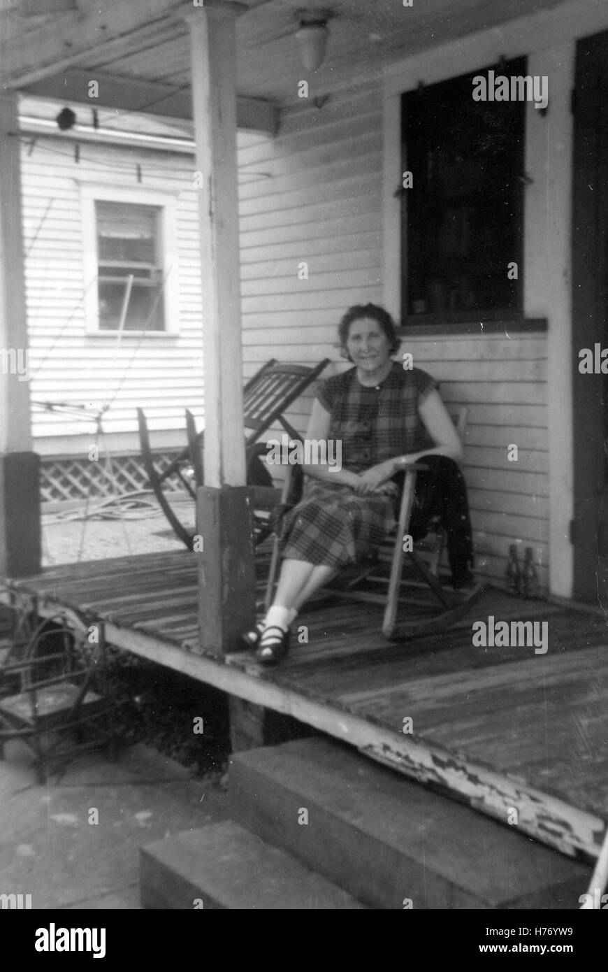 Old woman rocking chair Black and White Stock Photos & Images - Alamy