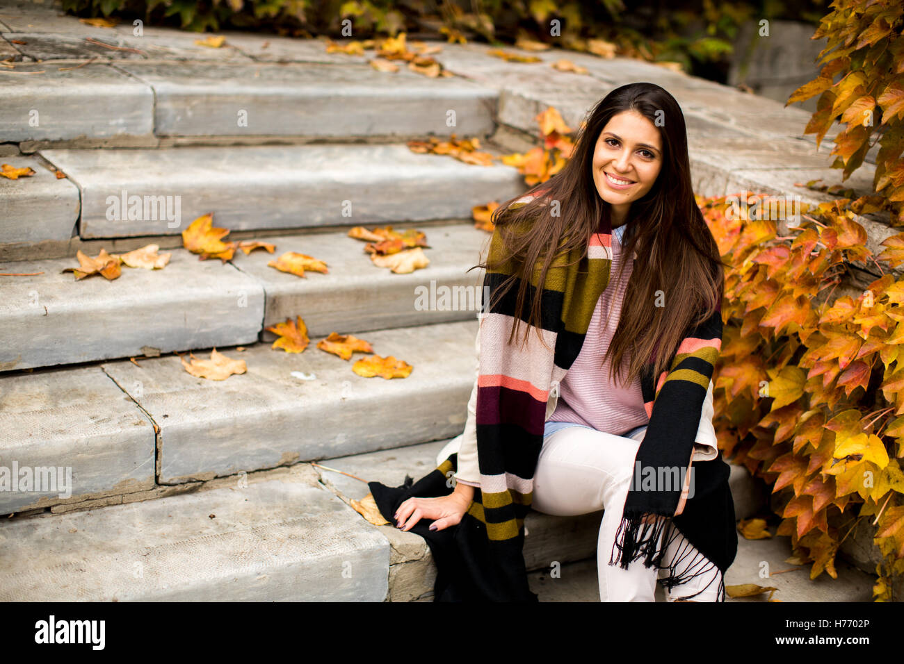 Woman steps sitting hi-res stock photography and images - Alamy