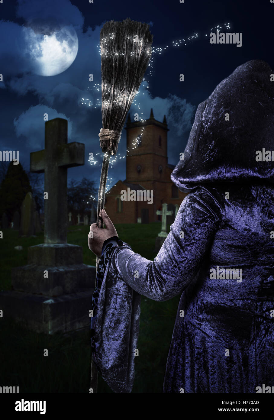 Halloween concept with witch in graveyard with broomstick Stock Photo ...