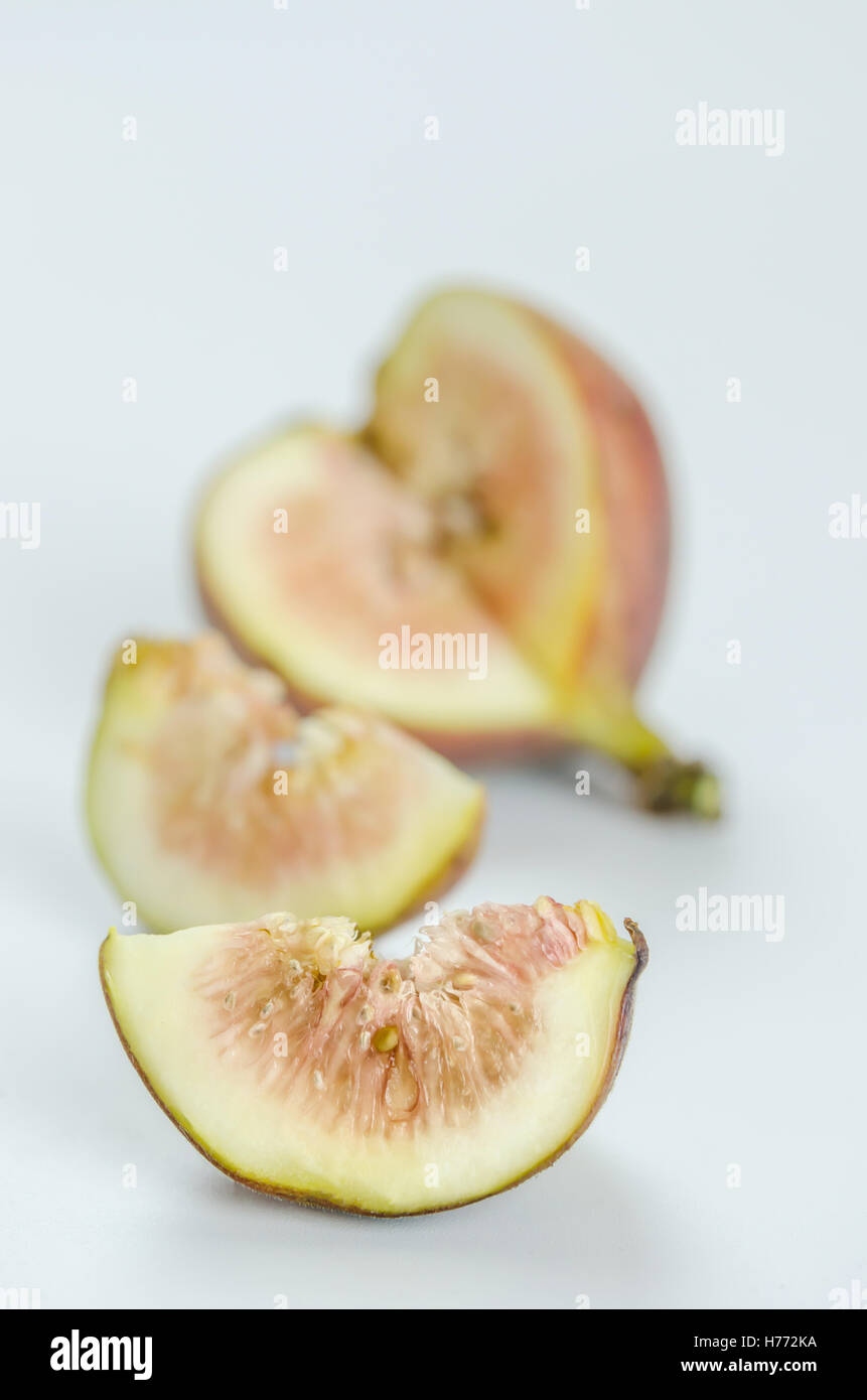 sliced fresh figs fruit on white background Stock Photo - Alamy