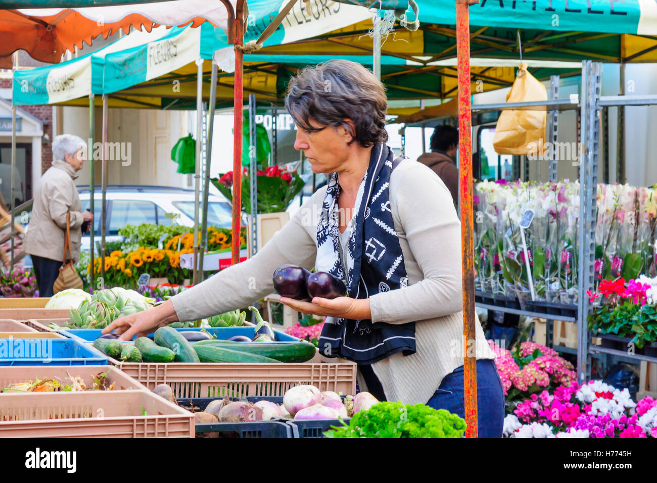 ARRAS, FRANCE - SEPTEMBER 15, 2012: Market scene in the town center ...