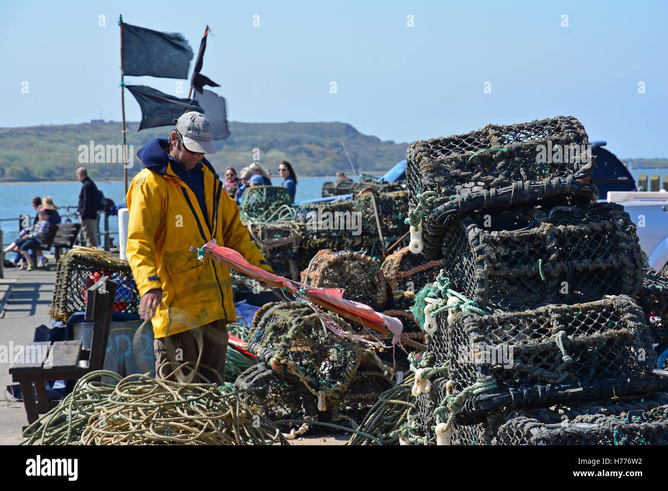Fisherman sorting nets hi-res stock photography and images - Alamy