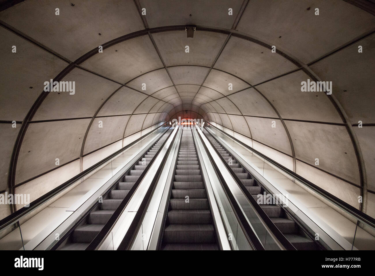Escalators output of a meter Stock Photo - Alamy