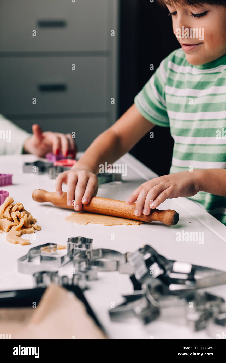 Boy making cookies hi-res stock photography and images - Alamy