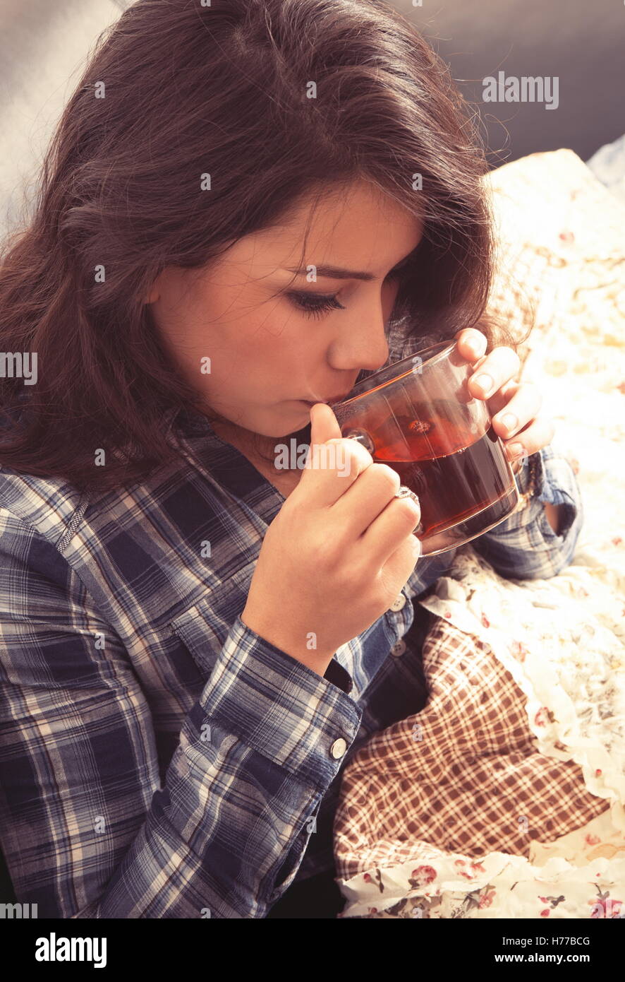 brunette girl with tea Stock Photo - Alamy