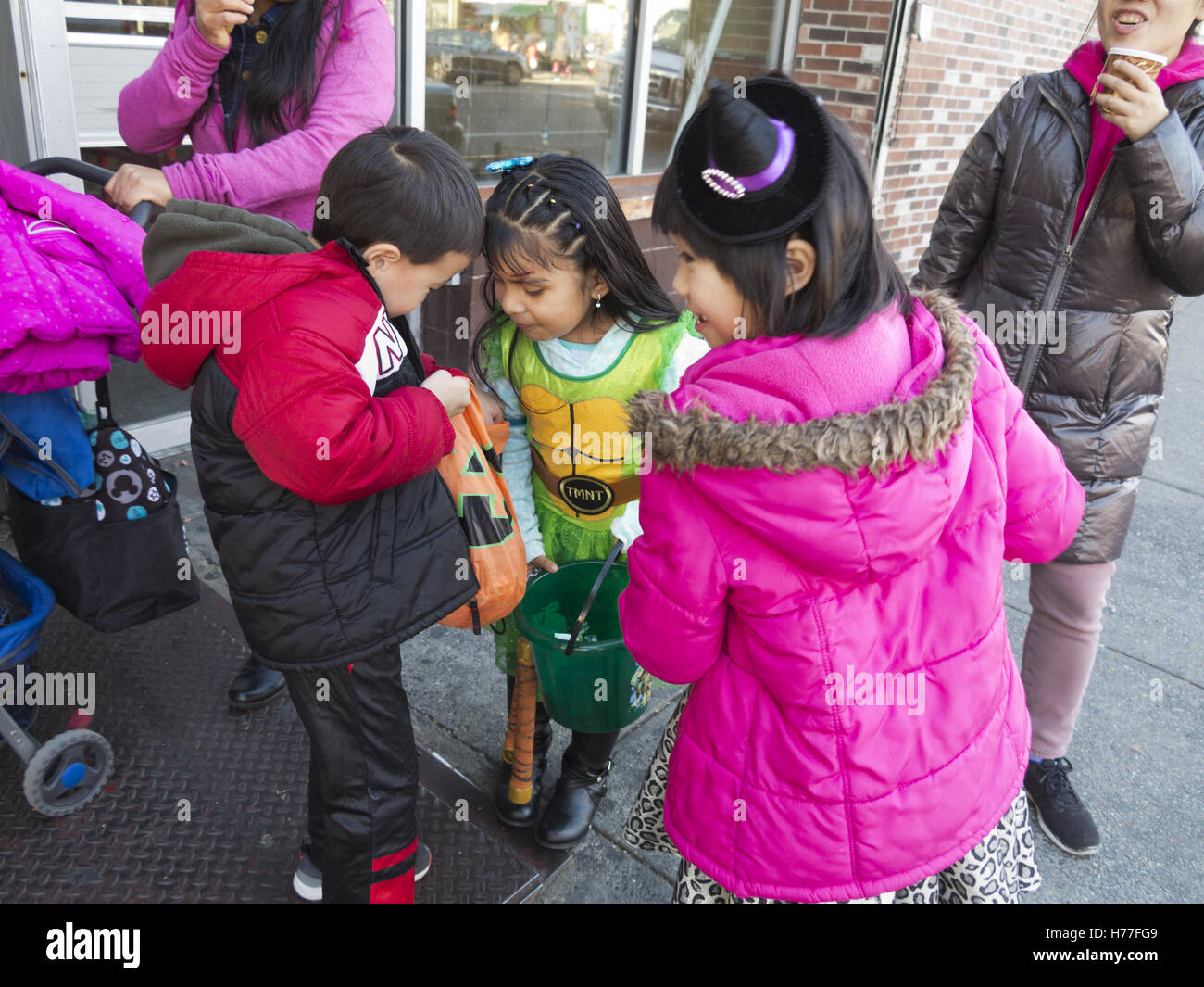 Children check out their Halloween candy cache in the Bensonhurst ...
