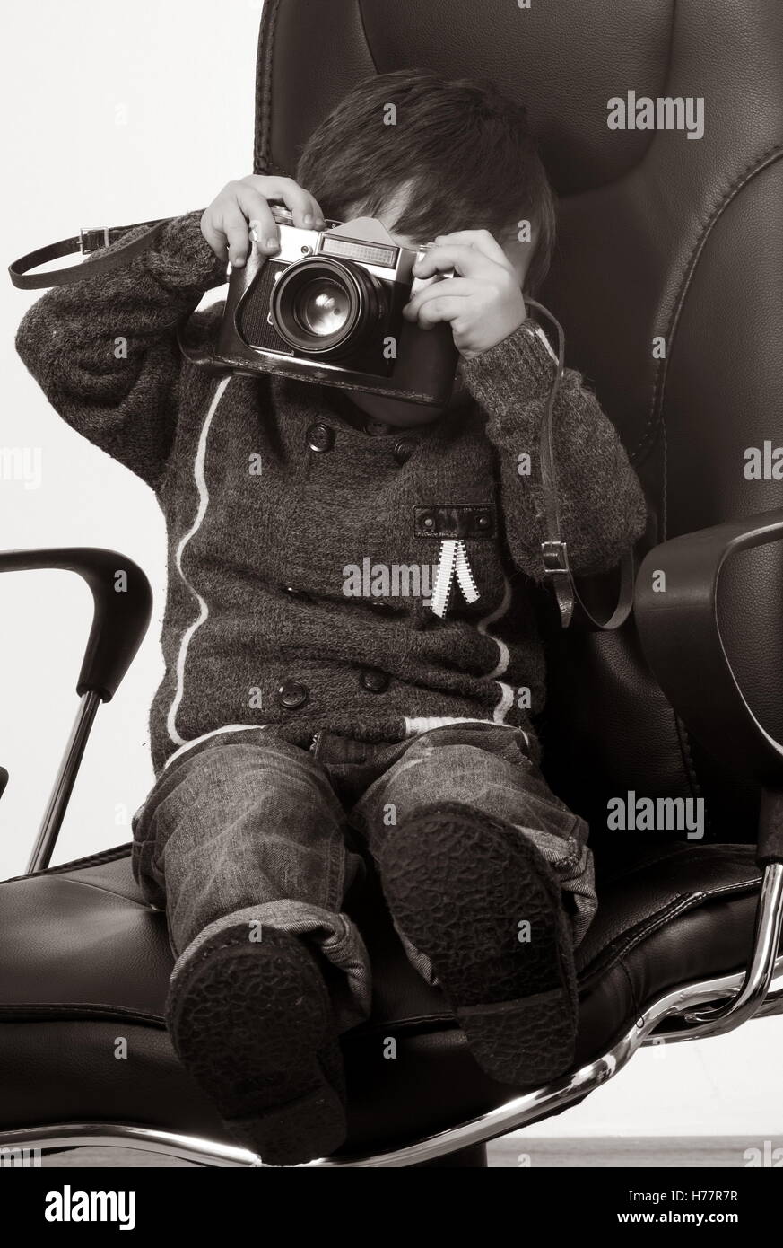 portrait of the boy with camera Stock Photo - Alamy
