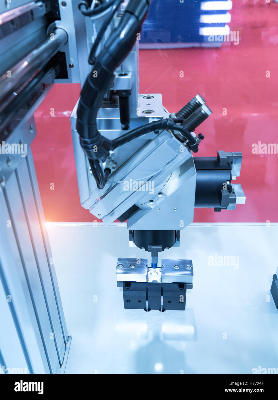 robot working in factory,Controler of robotic hand Stock Photo - Alamy