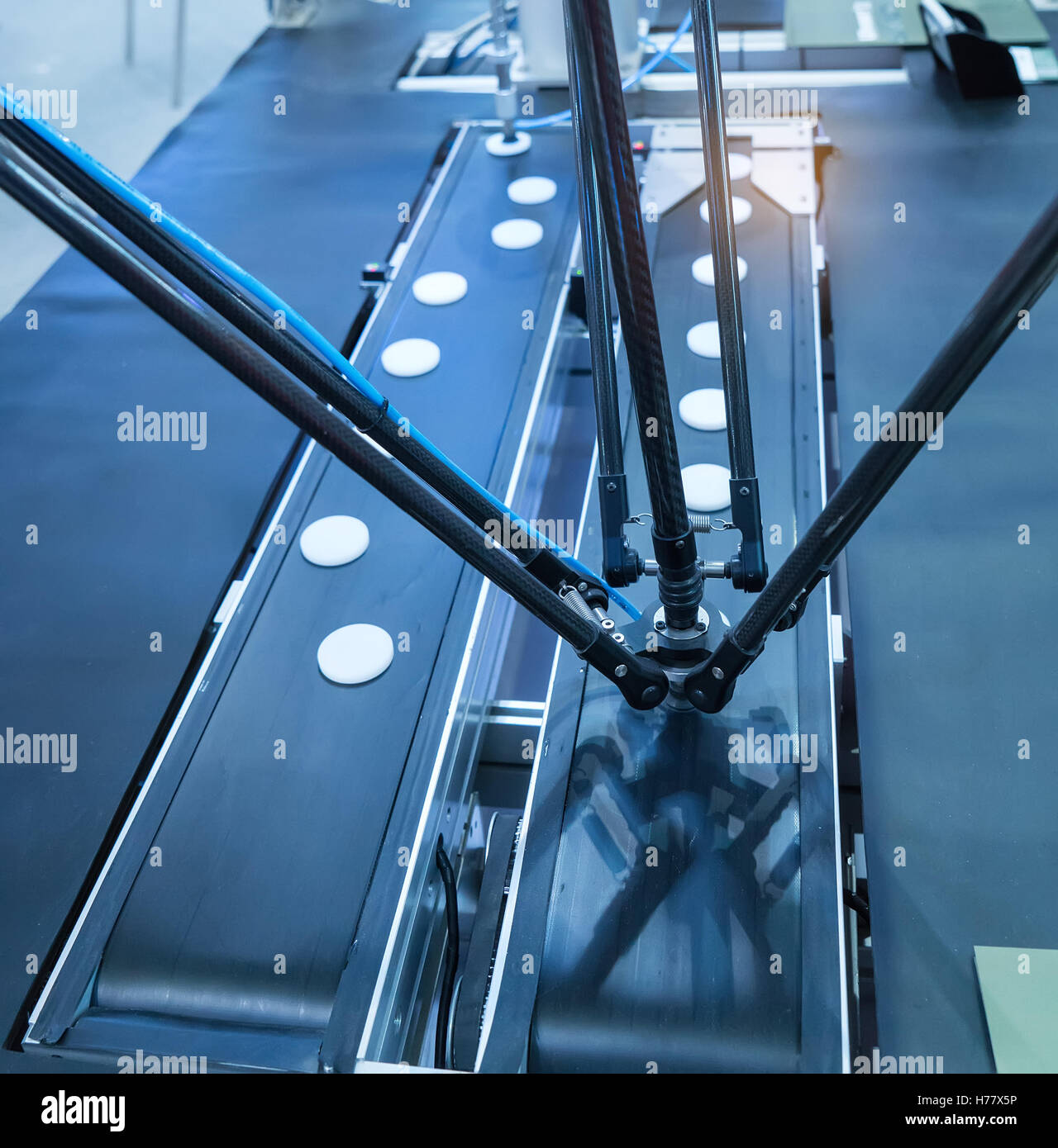 Robotic arm at production line in factory Stock Photo - Alamy