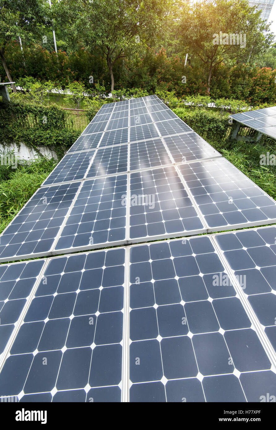 Solar Panels In The Park Of Modern City Stock Photo - Alamy
