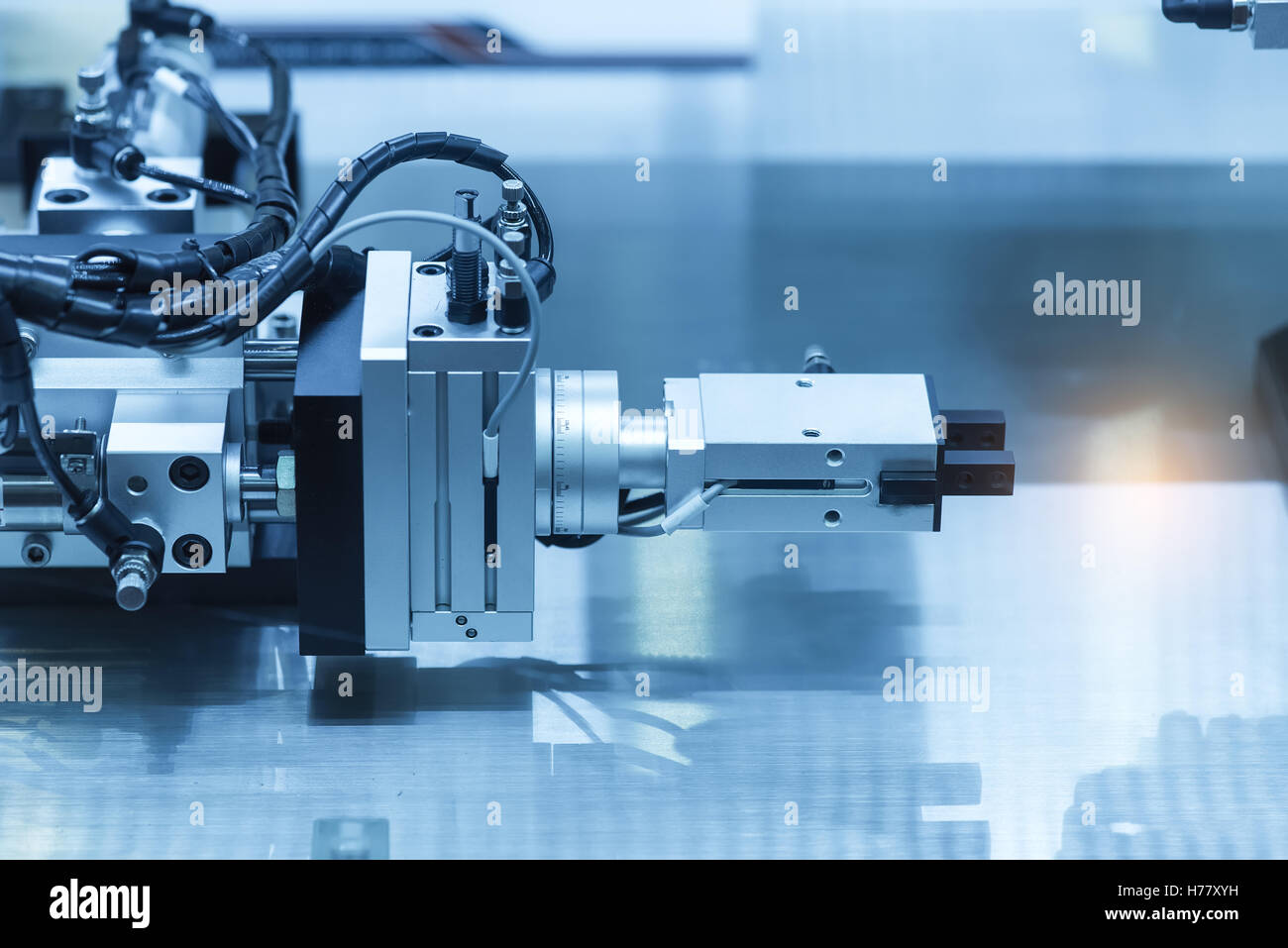 Robotic arm at production line in factory Stock Photo - Alamy