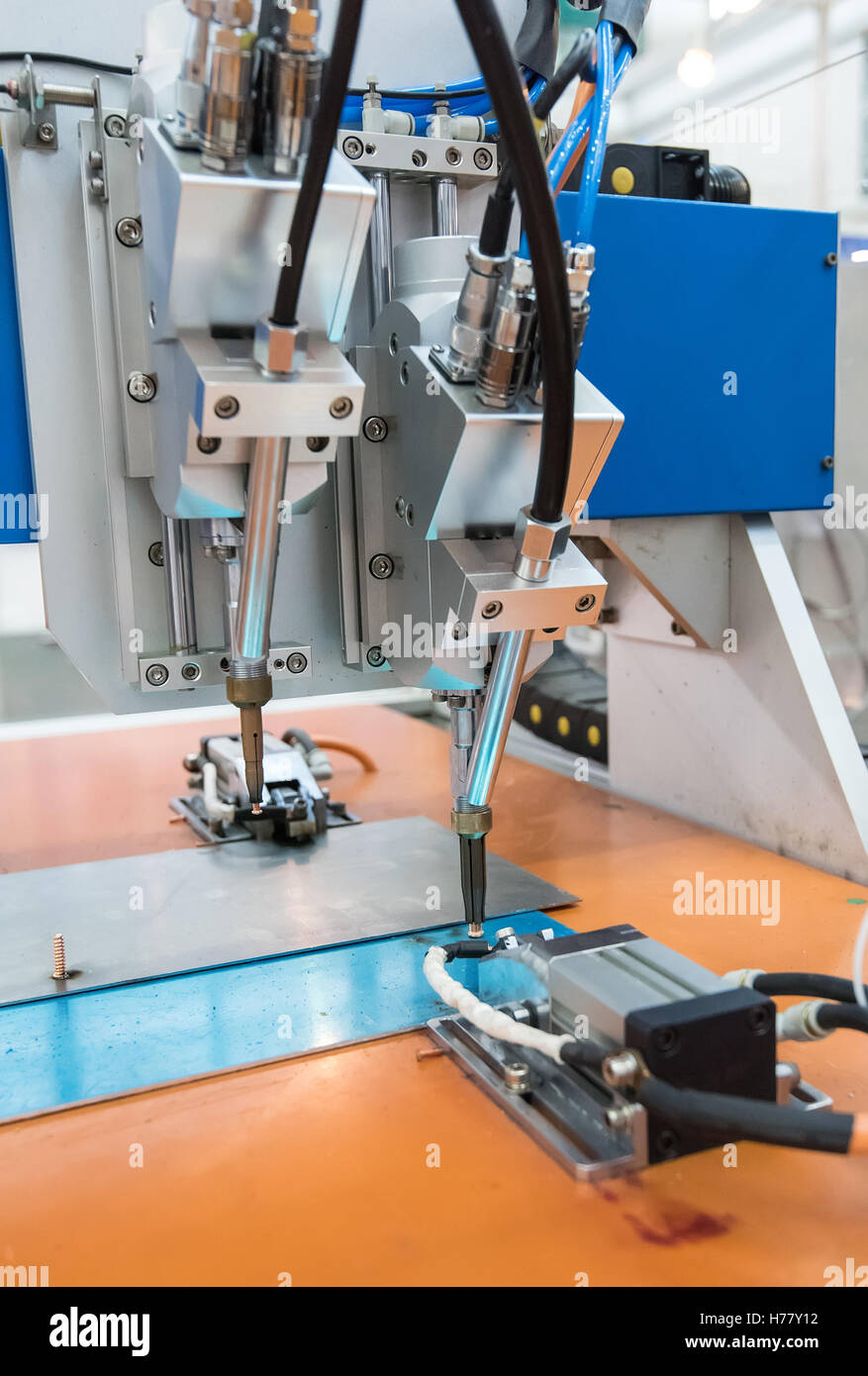 Robotic arm at production line in factory Stock Photo - Alamy