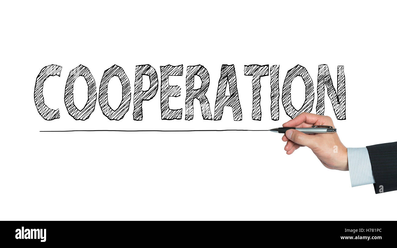 cooperation written by hand, hand writing on transparent board, photo ...