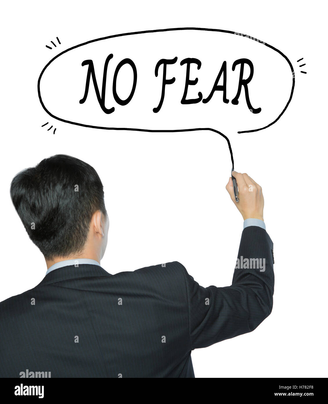 no fear written by businessman in black suit, hand writing on ...