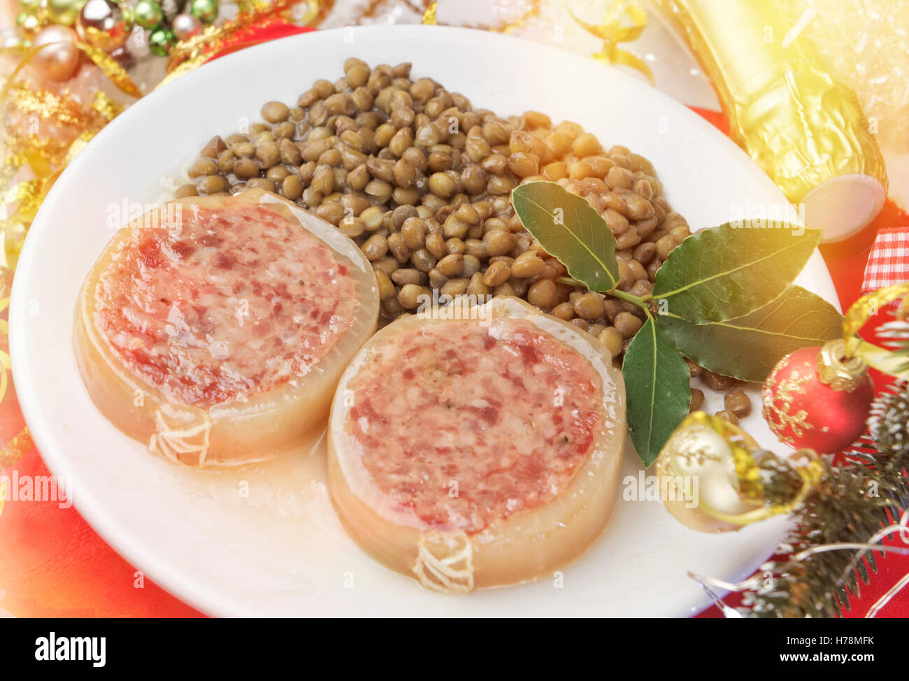 Traditional Italian cotechino on Christmas table Stock Photo - Alamy