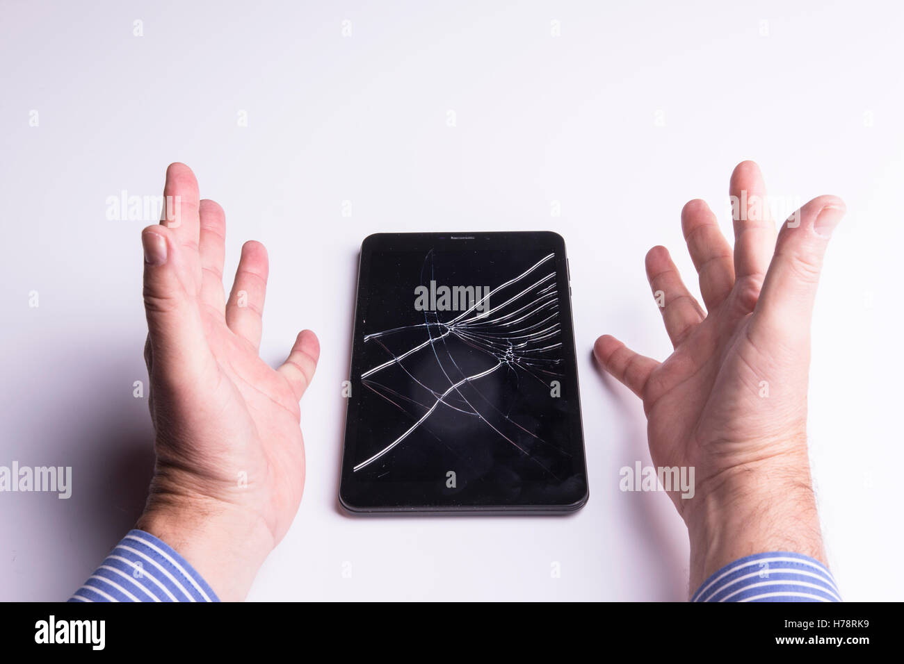 tablet with screen crashed Stock Photo - Alamy