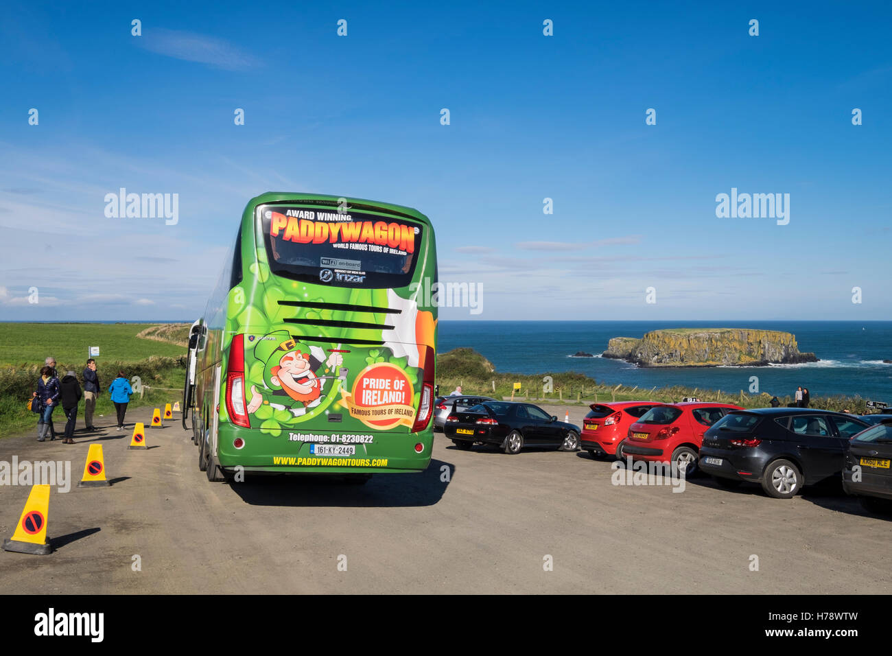 Paddywagon tour bus at Carrick a Rede, Antrim, Ireland Stock Photo - Alamy