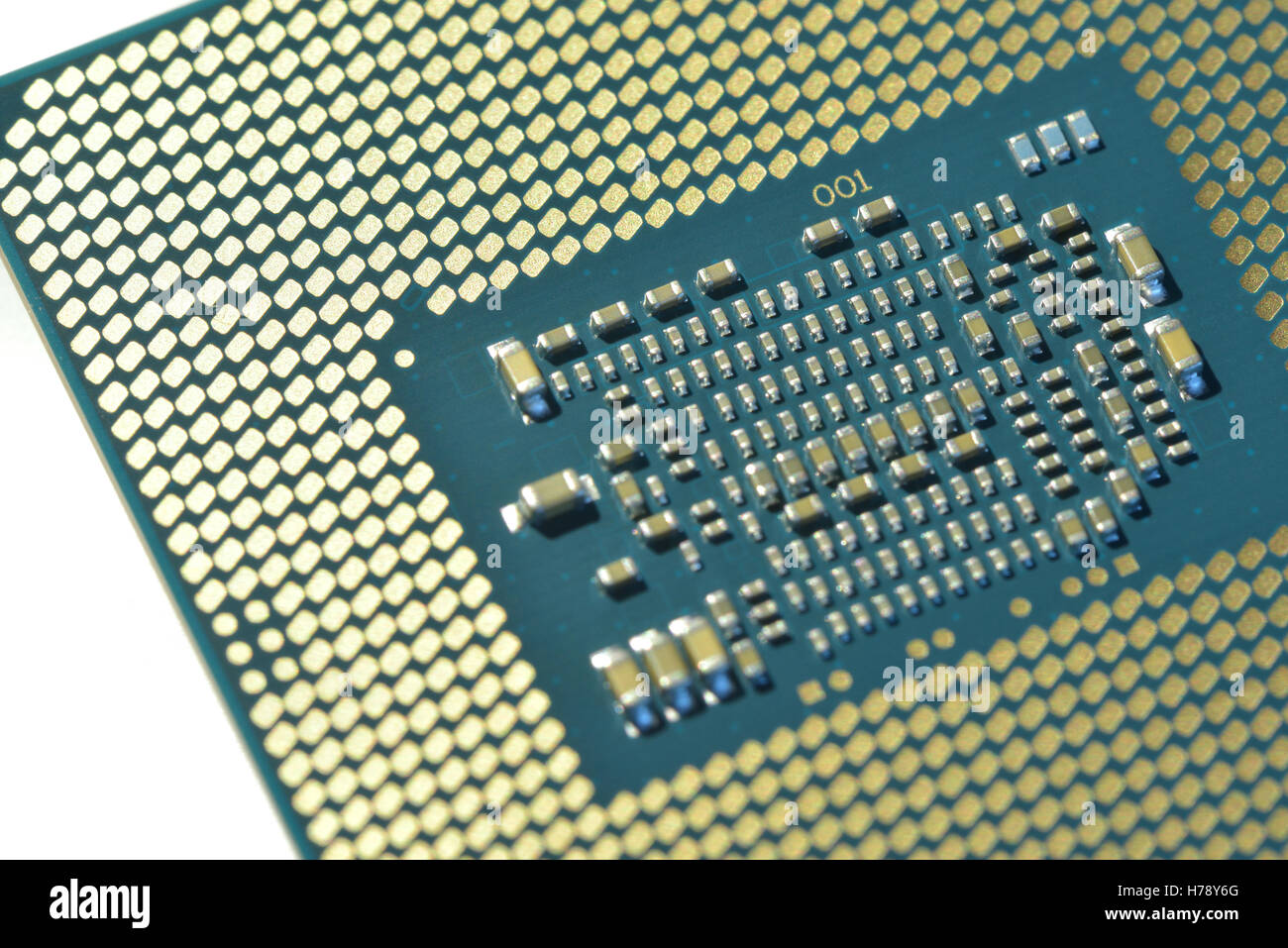 Back side of a CPU with connectors and chips Stock Photo - Alamy