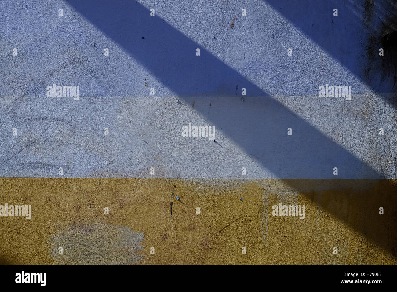 painted hoarding with shadow Stock Photo - Alamy