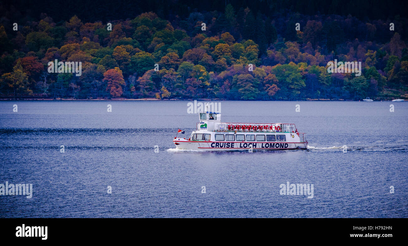 Small passenger cruise boat on Loch Lomond, Scotland Stock Photo - Alamy