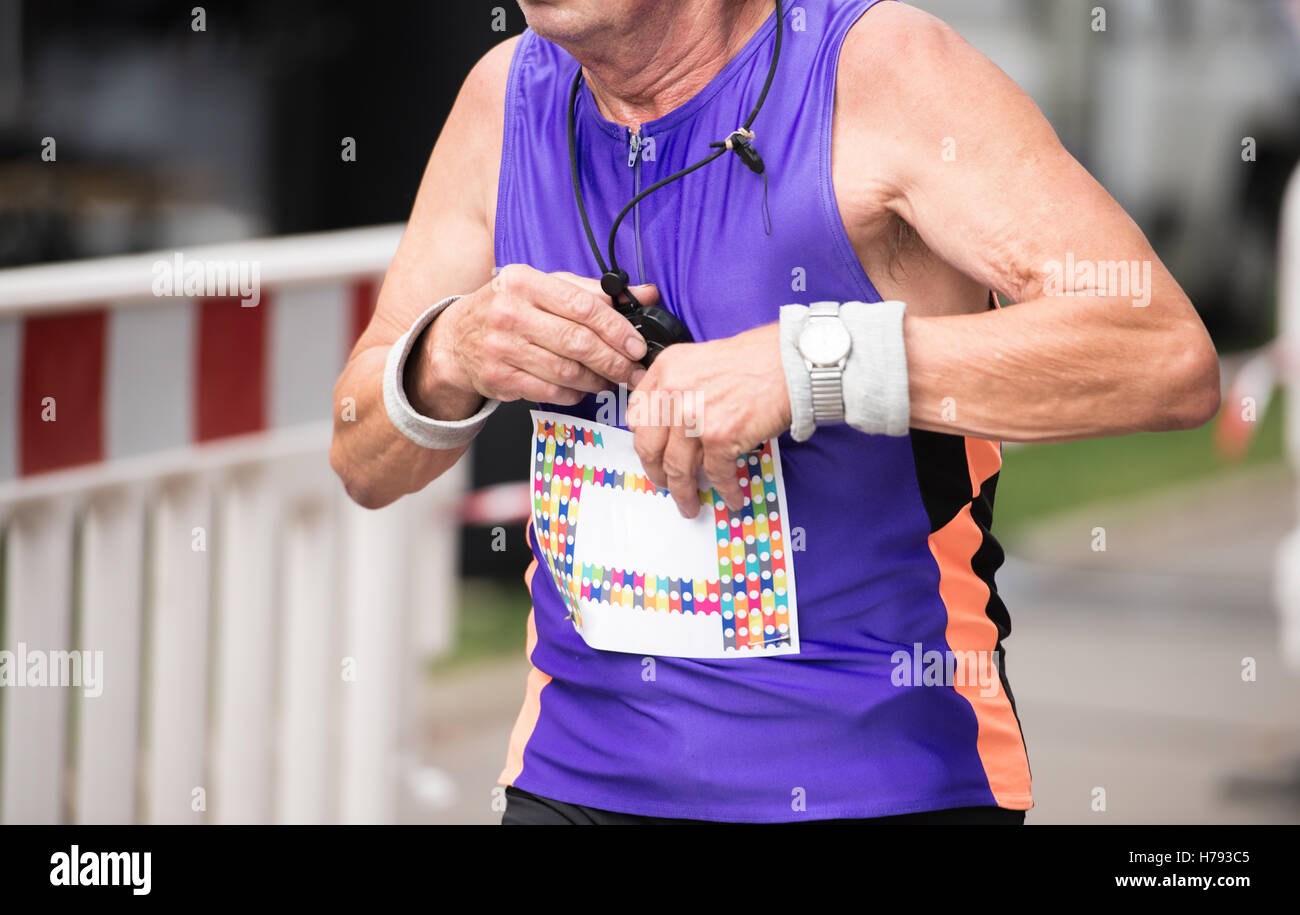 Unrecognizable senior runner outdoors. Long distance running Stock ...