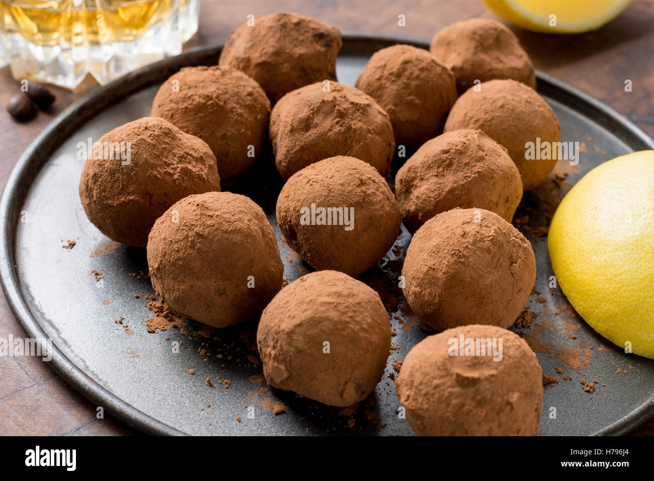 Homemade chocolate truffles on plate, close up Stock Photo - Alamy