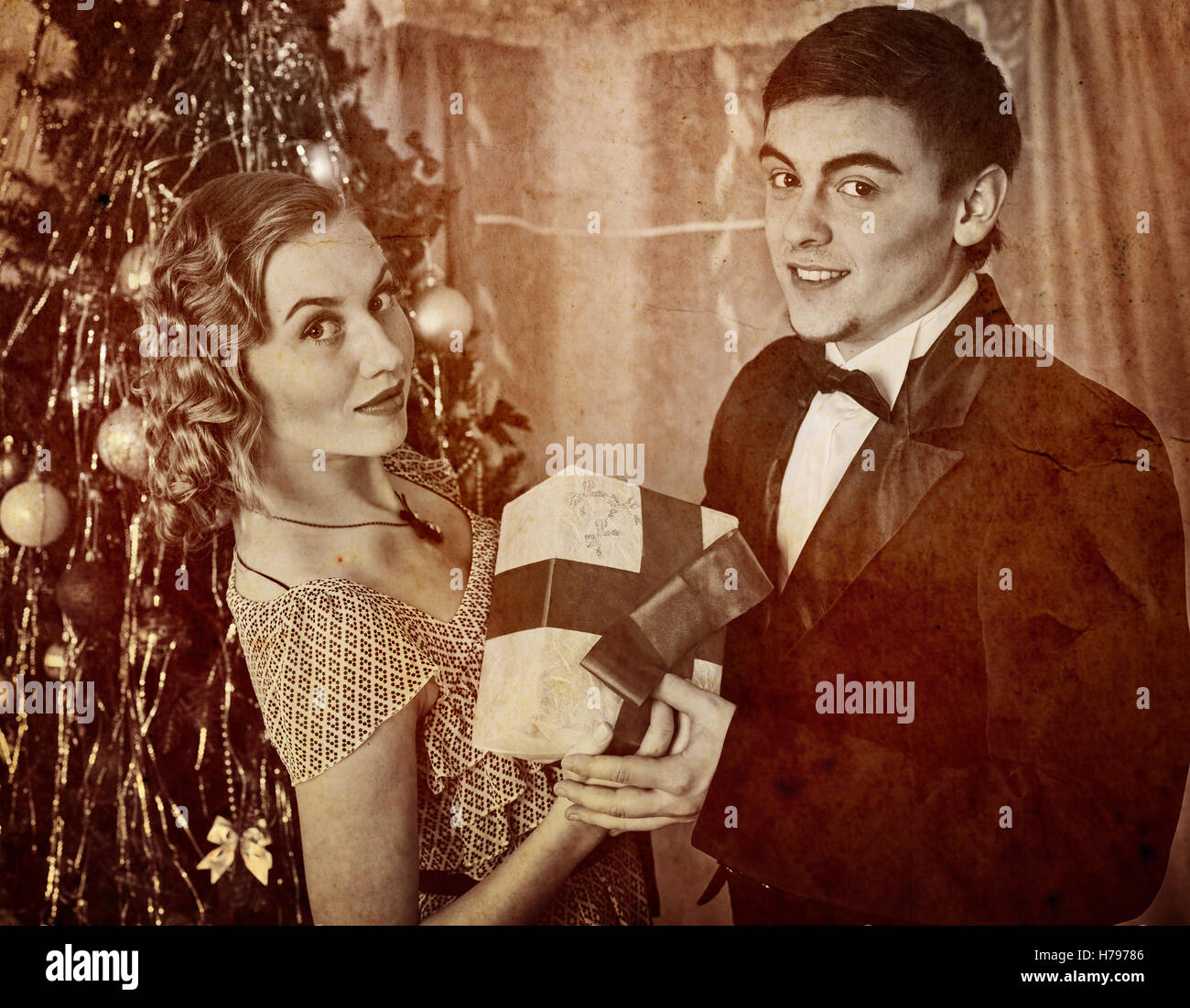 Retro vintage portrait of couple Christmas party. Black and white Stock ...