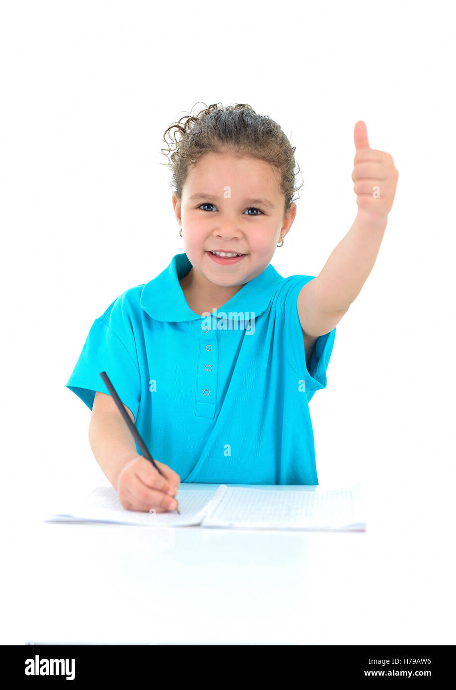 Young girl tired doing homework Cut Out Stock Images & Pictures - Alamy