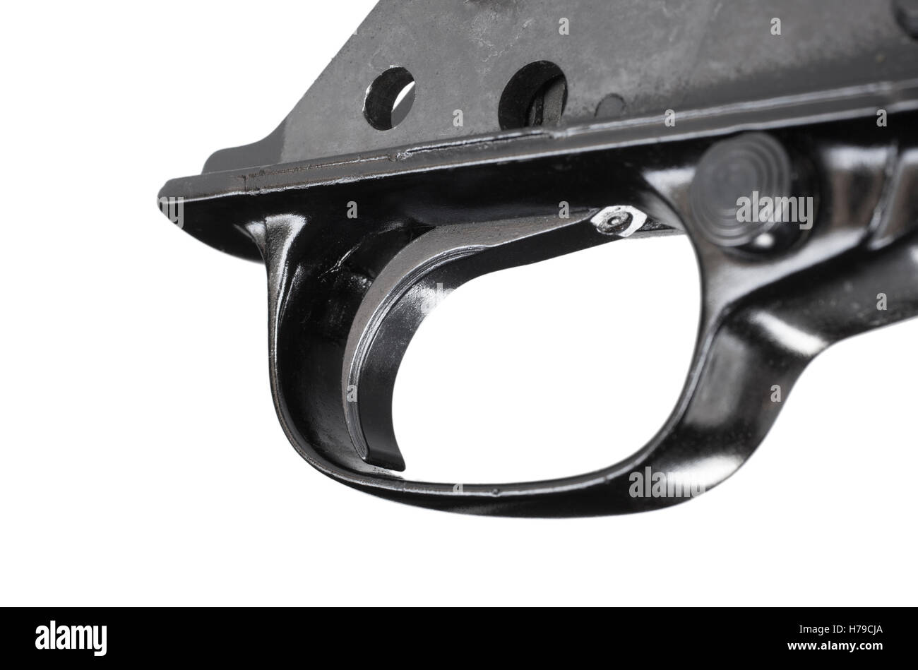 Metal trigger for a rifle out of the gun isolated on white Stock Photo ...