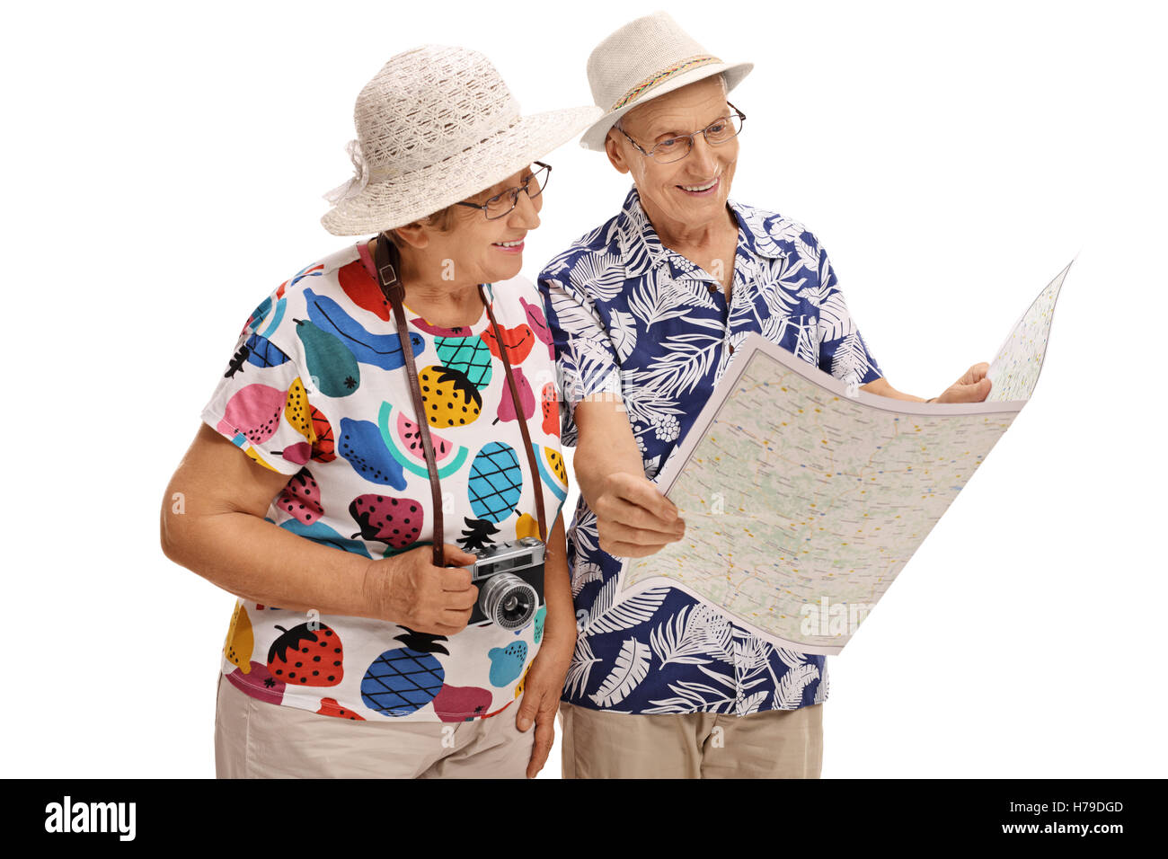 Elderly tourists looking at a generic map isolated on white background ...