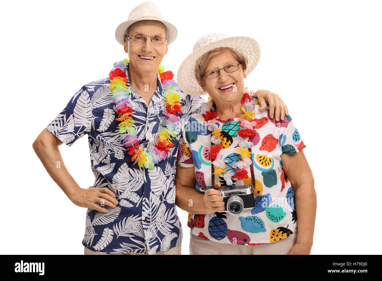 Happy mature tourists posing together and looking at the camera ...