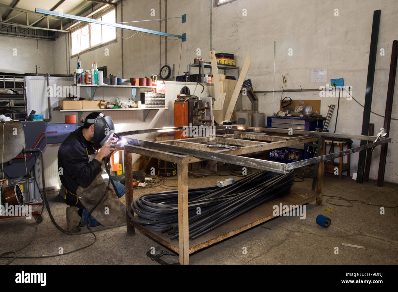 metalworker at work in his workshop Stock Photo - Alamy