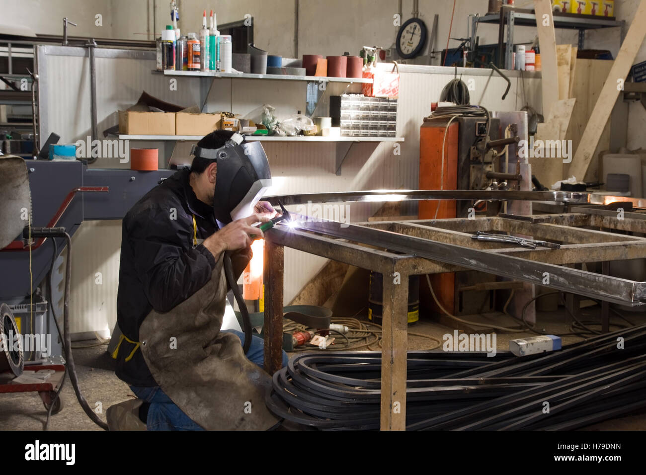 metalworker at work in his workshop Stock Photo - Alamy