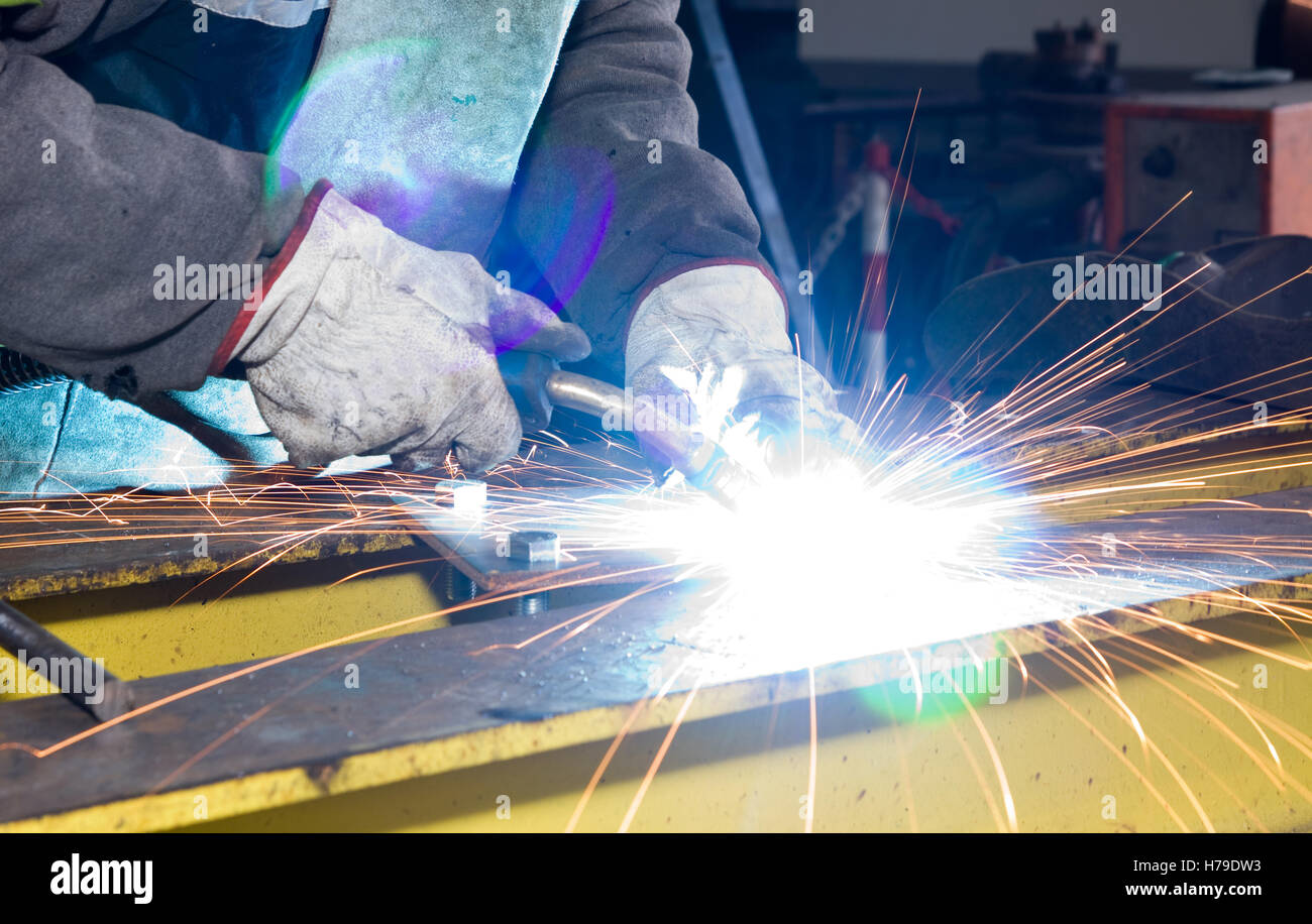 metalworker at work in his workshop Stock Photo - Alamy