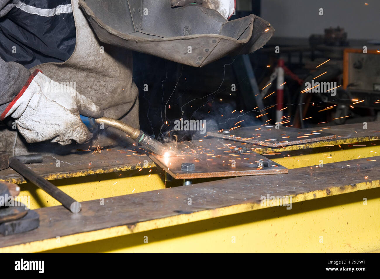 metalworker at work in his workshop Stock Photo - Alamy