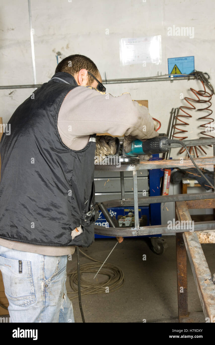 metalworker at work in his workshop Stock Photo - Alamy