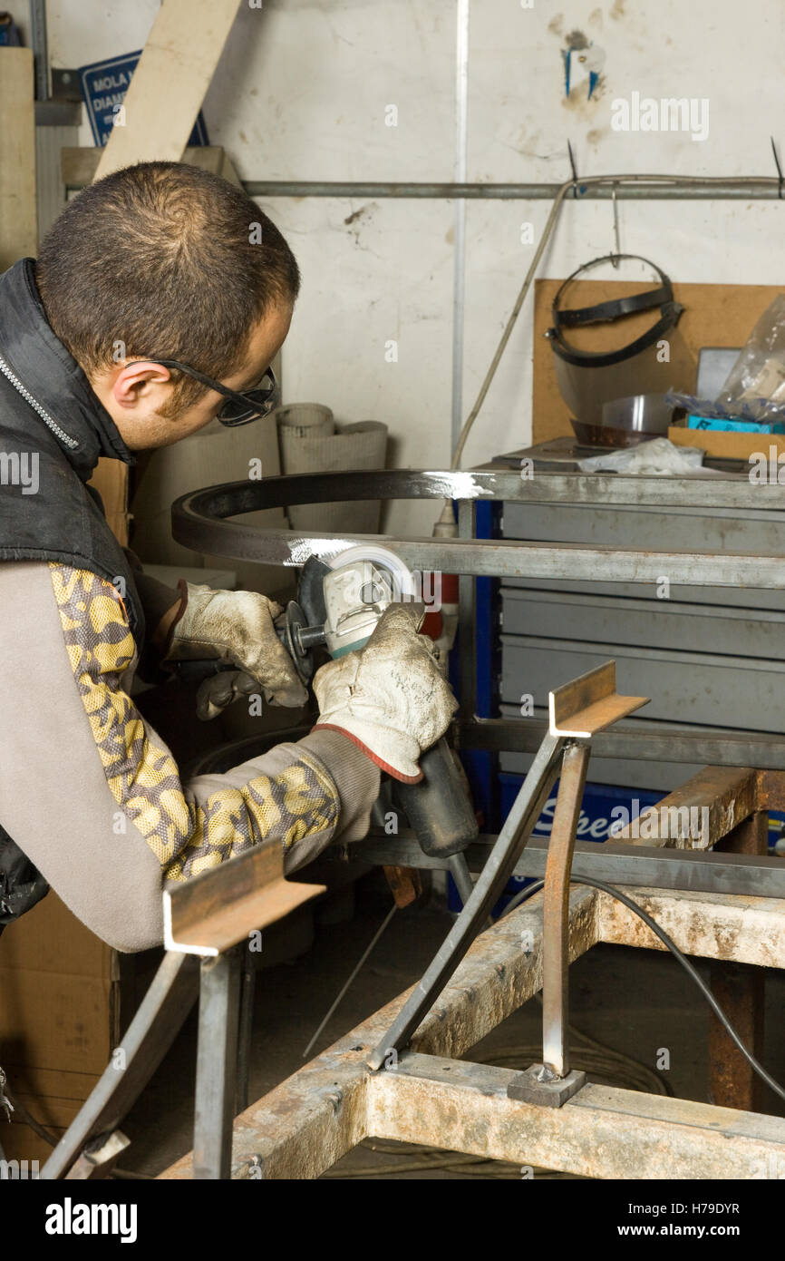 metalworker at work in his workshop Stock Photo - Alamy
