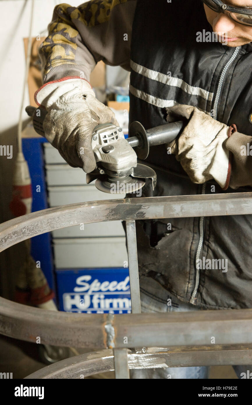 metalworker at work in his workshop Stock Photo - Alamy