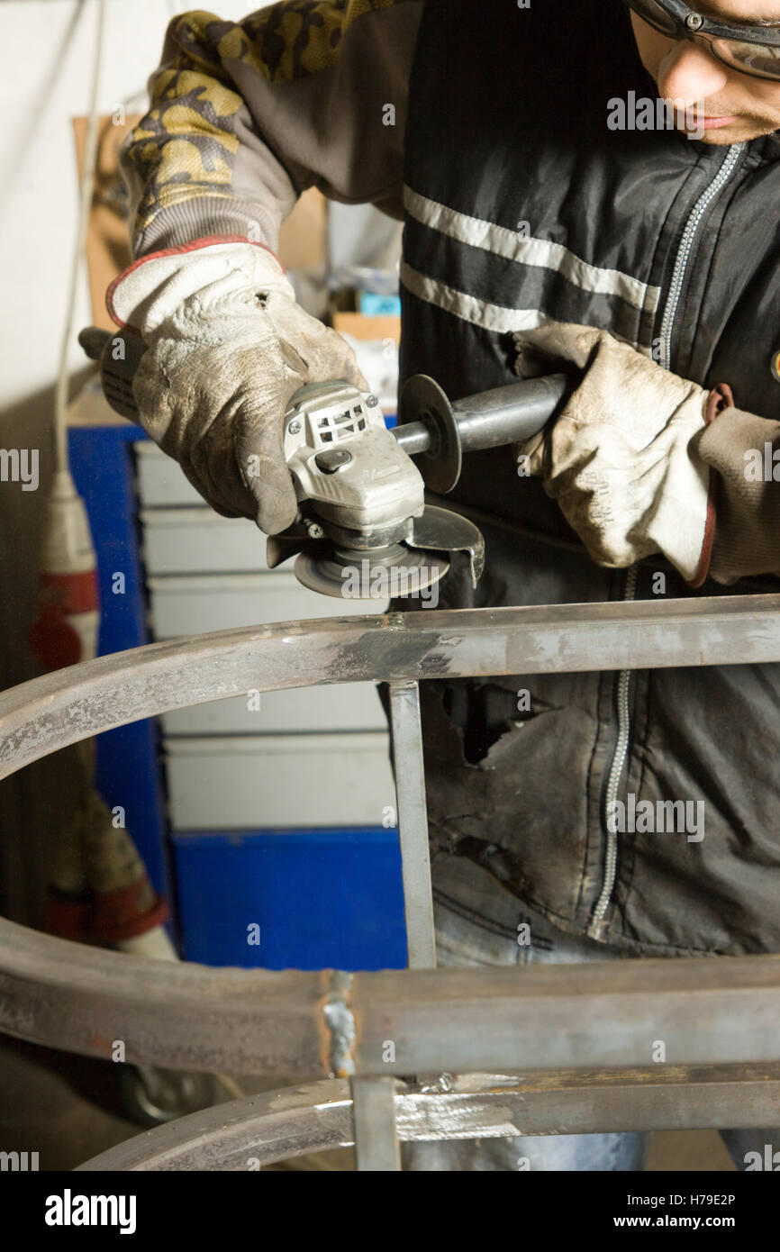 metalworker at work in his workshop Stock Photo - Alamy