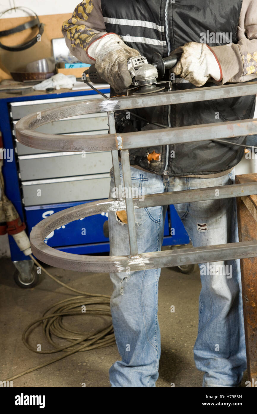 metalworker at work in his workshop Stock Photo - Alamy