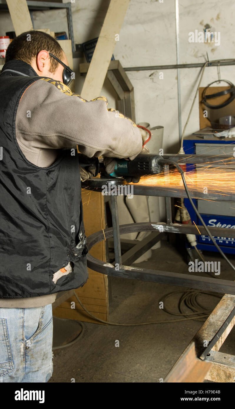 metalworker at work in his workshop Stock Photo - Alamy